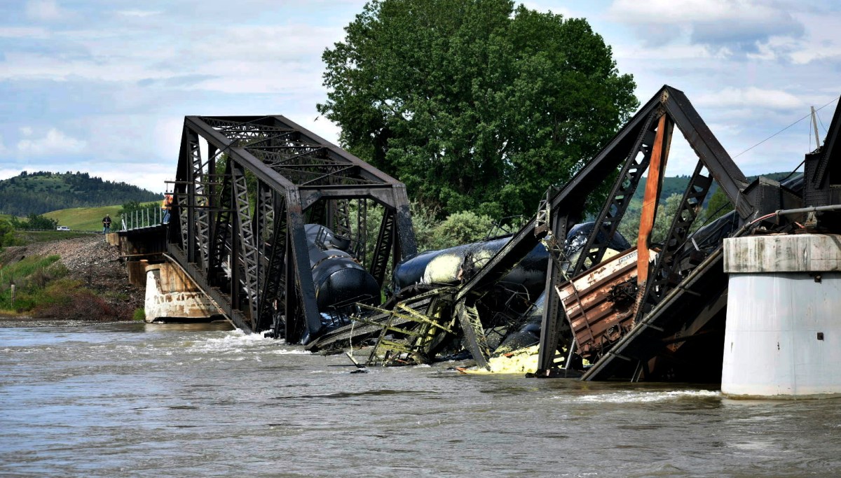 Derailed train on collapsed bridge contaminates Yellowstone River