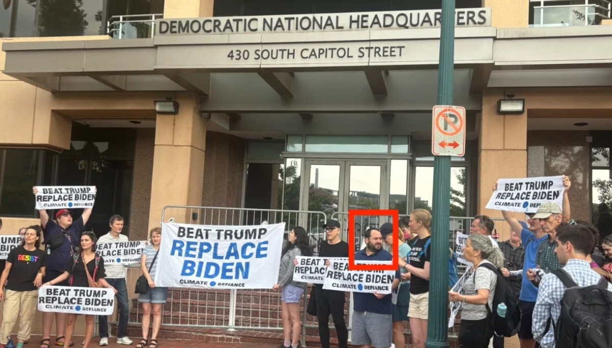 Federal official protests with disruptive climate group against Biden ...