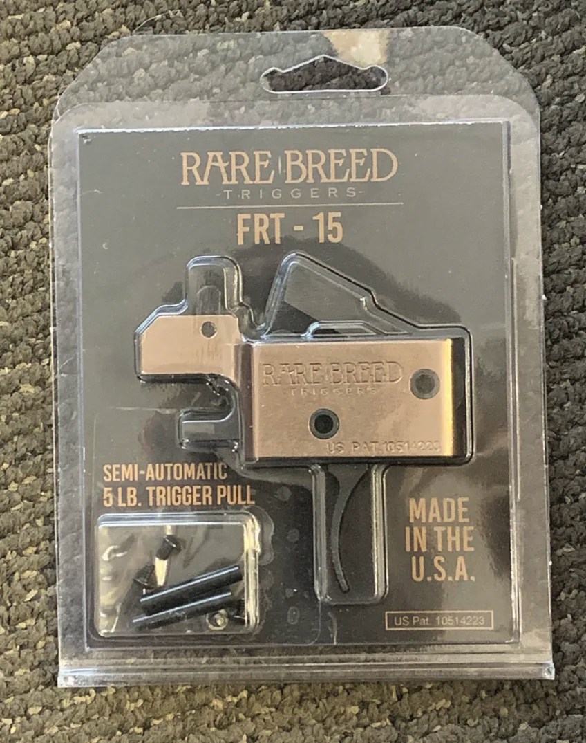 DOJ settles suits with gun parts maker in win for firearms advocates