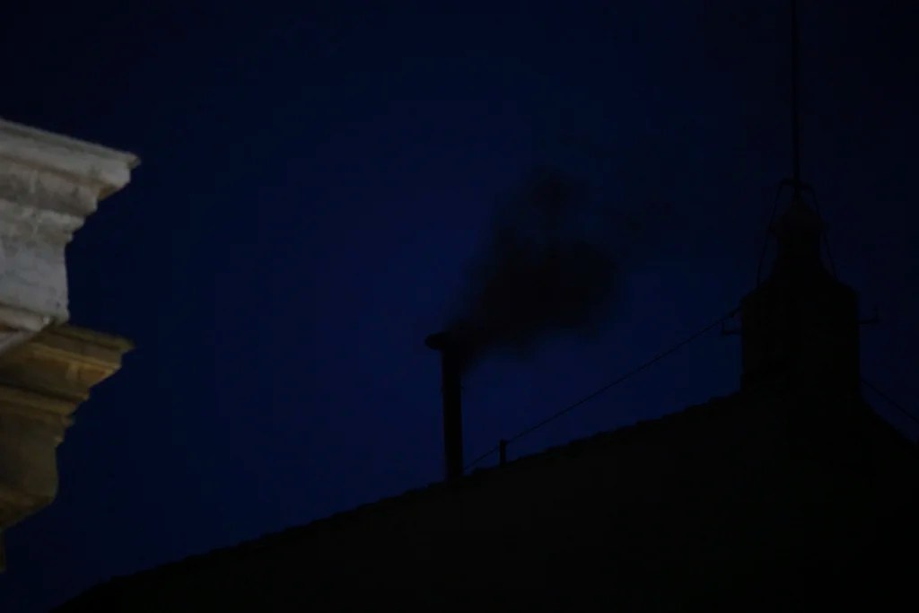 First vote of conclave ends with black smoke