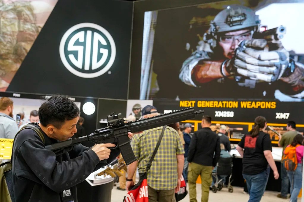 The gun that allegedly shoots by itself: New Hampshire-based Sig Sauer ...