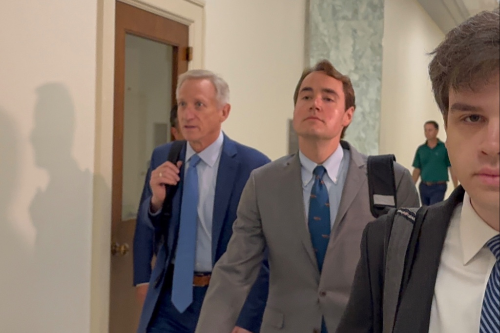 Andrew Bates arrives for interview in autopen investigation